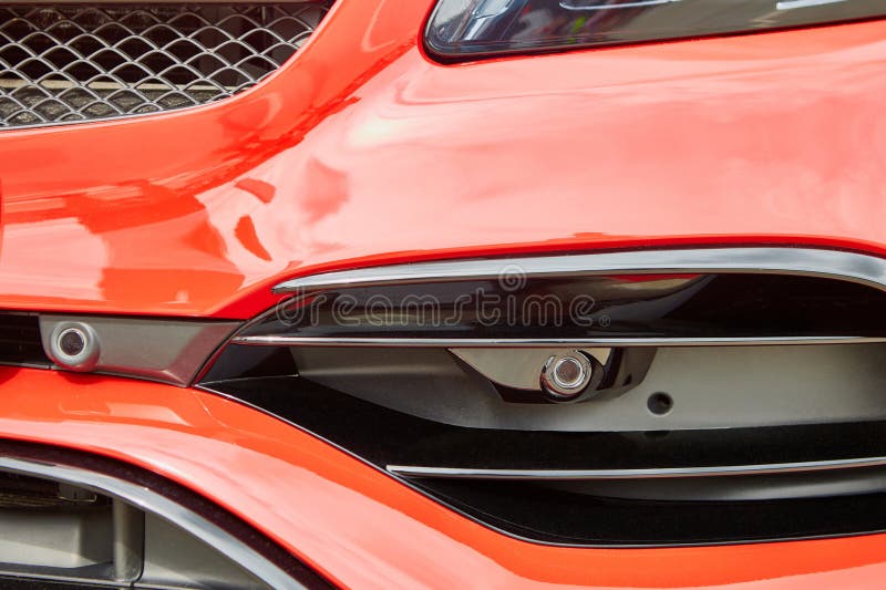 Front Parking Sensor on a Red Modern Car. Car Front Bumper with Parking ...