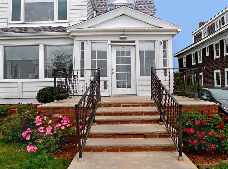 Front Porch with Rose Bushe Stock Image - Image of house, working: 65444625