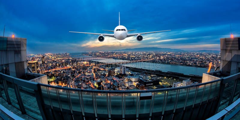 Front of Real Plane Aircraft, on Japan Cityscape Background Stock Photo ...