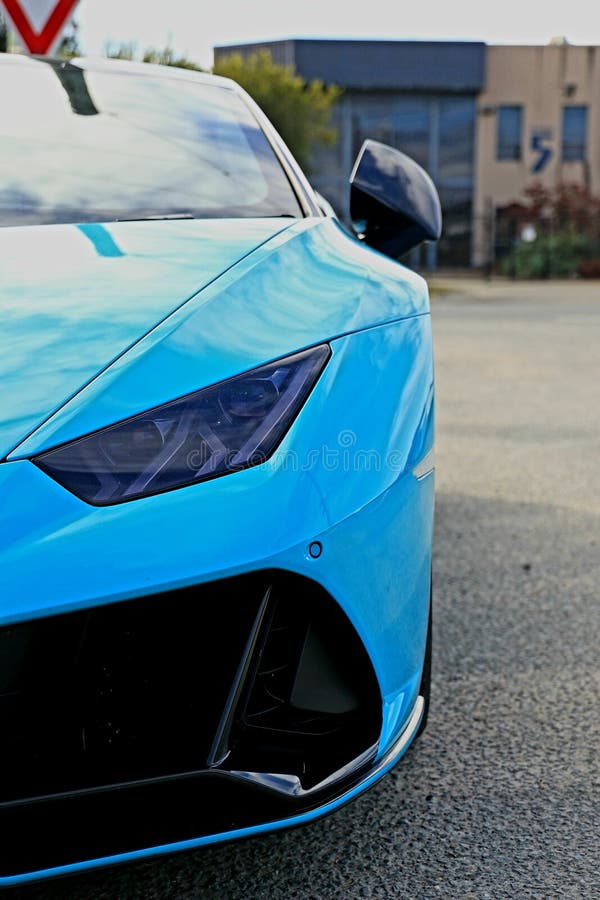 Front Shot of a Blue Car Headlights Stock Image - Image of ...