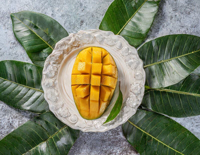 Front Shot of the Inside of the Mango Fruit on a Wooden Kitchen Table ...