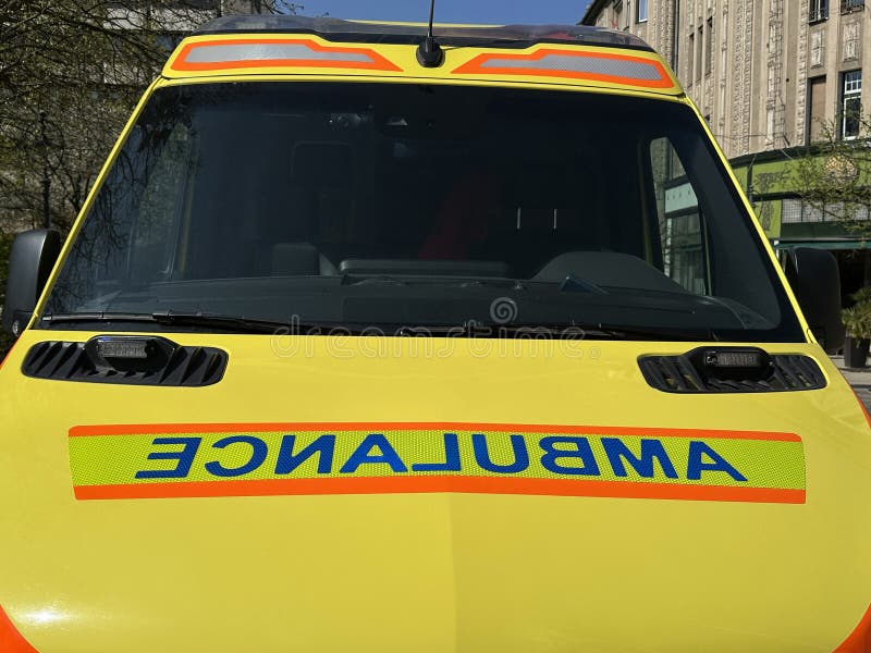 Front Side of an Ambulance on the Street Stock Photo - Image of people ...