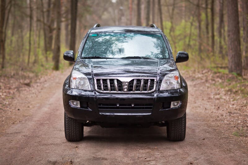 Front Side of the Black SUV in Forest Stock Photo - Image of automobile ...