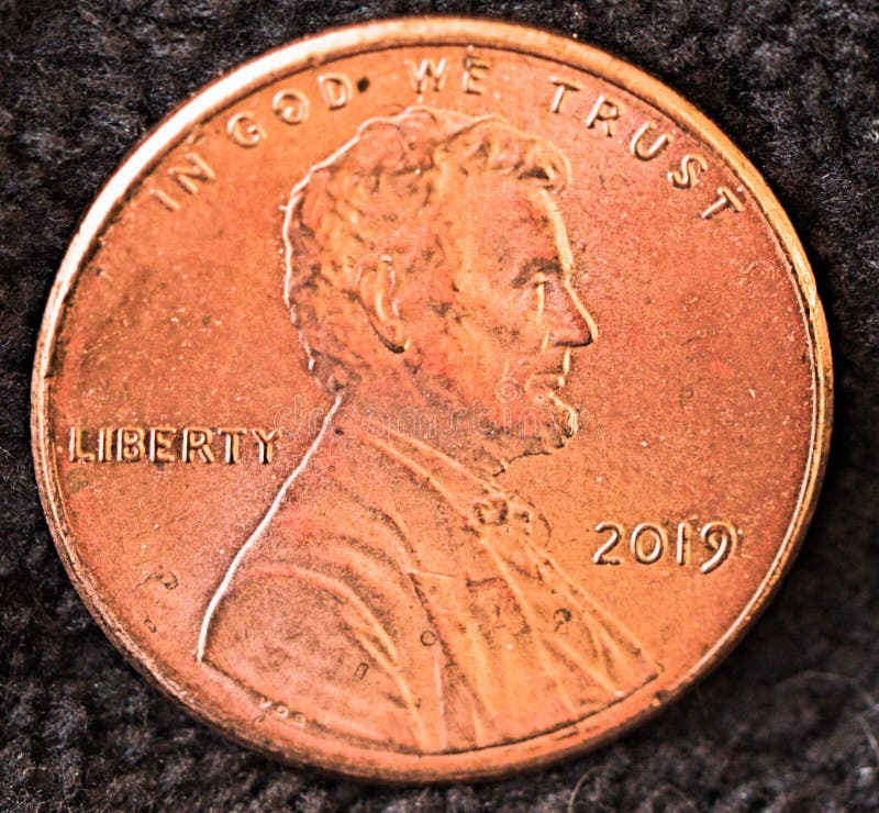 Penny - Front Side with Abraham Lincoln Behind a Magnifying Glass Stock ...