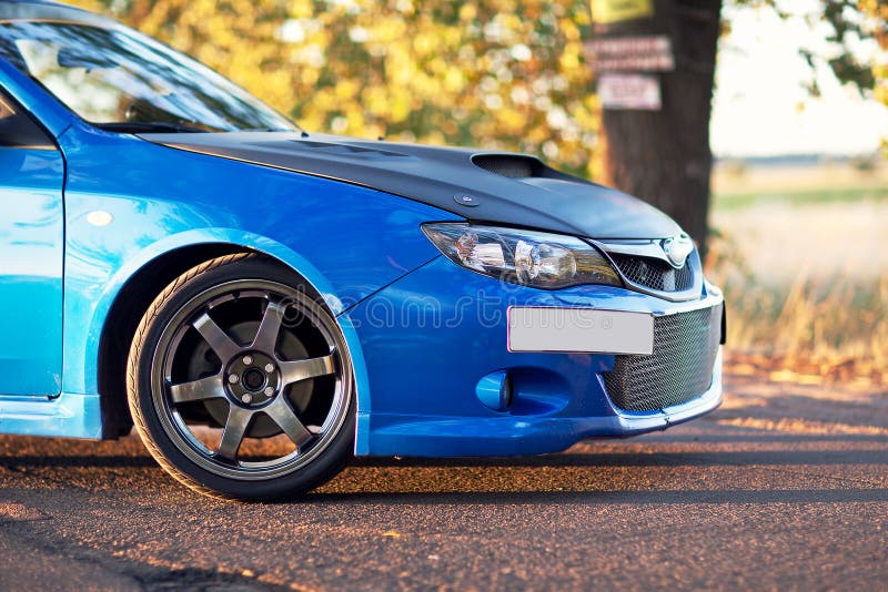 Front Side View of Blue Sport Car Stock Photo - Image of modern, metal ...