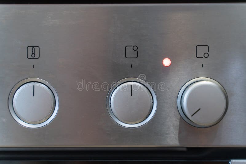 The Front Silver Control Panel of the Stove with Handles Switching ...