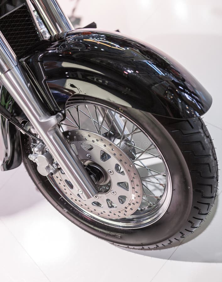 The Front Tire of a Parked Custom Motorcycle Stock Image - Image of ...
