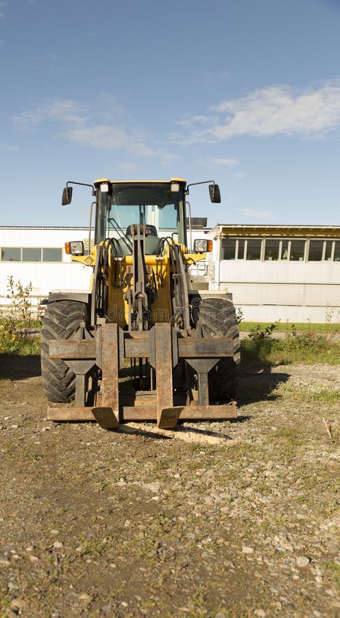 In front of the tractor stock photo. Image of building - 60068510