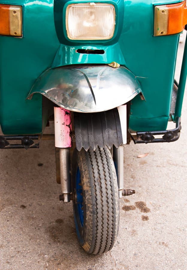 Front of the tricycle stock photo. Image of green, tricycle - 22502576