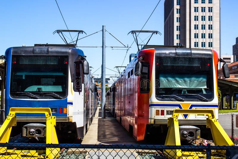 Front of Two Commuter Trains Stock Photo - Image of building, green ...