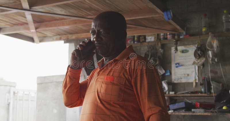 Front View of an African Male Owner of a Panel Beater Workshop in a ...
