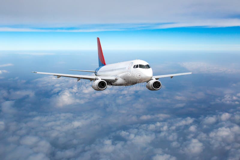 Front View of Aircraft in Flight. the Passenger Plane Flies High Above ...