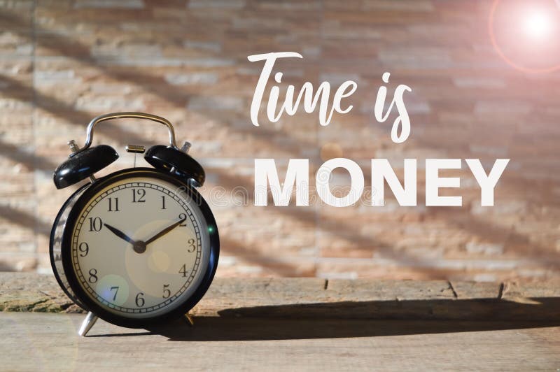 Front View of Alarm Clock on the Table with Text TIME is MONEY Stock ...