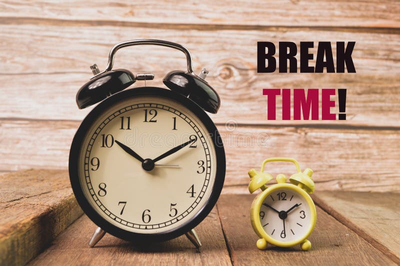 Front View of Alarm Clocks on Wooden Board with Text BREAK TIME Stock ...