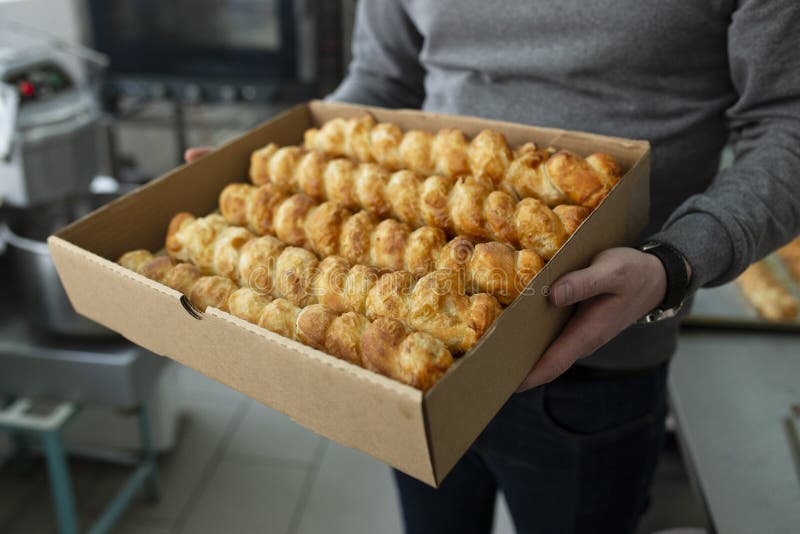 Front View of an Appetizing Dusted Salted Pies Baked Arranged in a Box ...