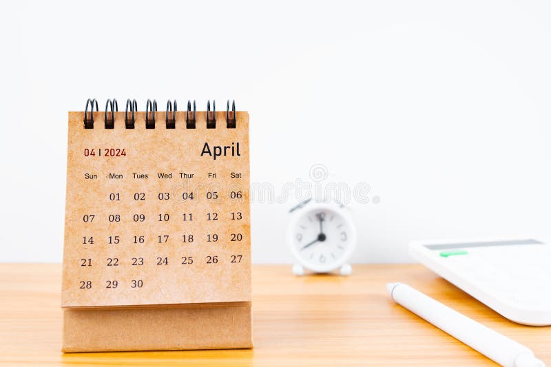 Front View of April 2024 Desk Calendar and Pen with Calculator Stock ...
