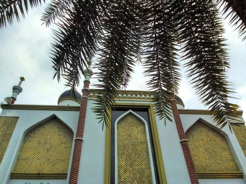 Front View of the Architectural Design of a Mosque and Date Palm Trees ...
