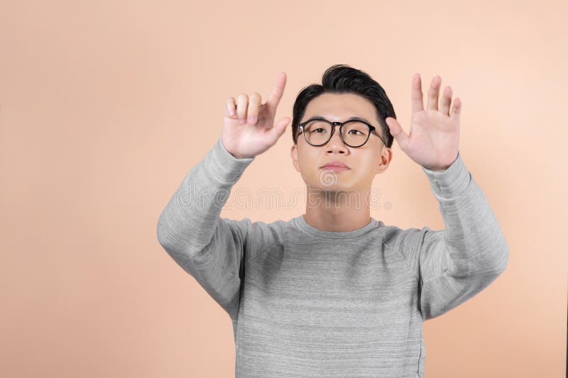 Front View of a Asian Man with His Hands Palms in Front of Him Stock ...