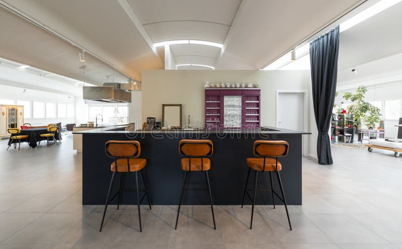 Front View with Bar Counter and Three Orange Leather Stools. Elegant ...