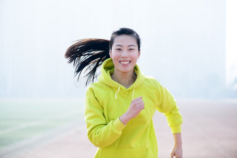 Front View of a Beautiful Sportswoman Running Towards Camera Stock ...
