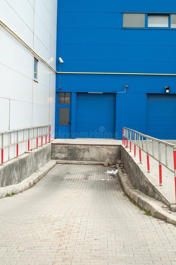 Front View of Blue Loading Docks Stock Photo - Image of architecture ...