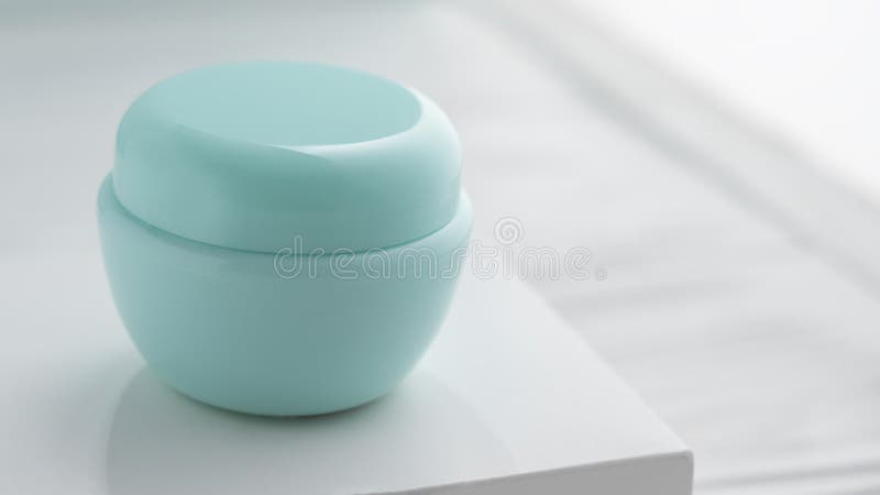 Front View of Blue Lotion Container on White Box with Copy Space Stock ...