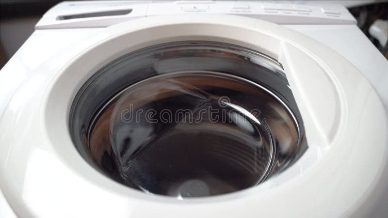 Washing Machine Finishes Spinning and Things Fall on the Glass Door ...