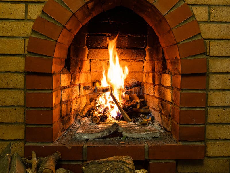 Front View of Brick Fireplace with Fire Stock Image - Image of burn ...