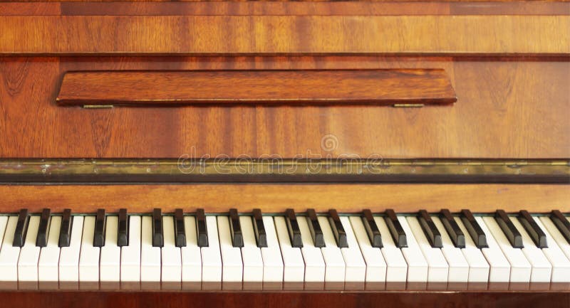 Front View of a Brown Old Piano. White Keys and Brown Piano Stock Photo ...