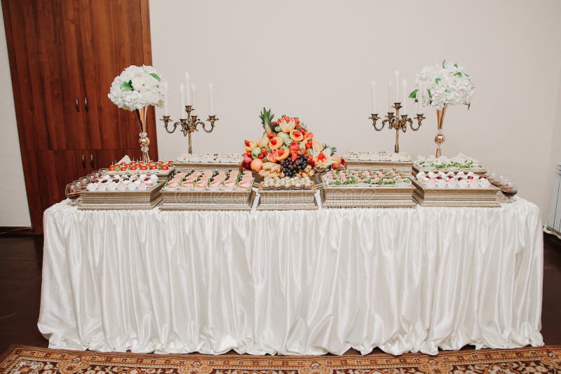 Front View of a Buffet Table with a Wedding Appetizer. a Set of Meat ...