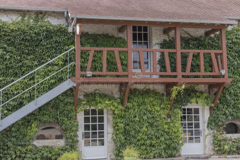 Front View of a Building with a Small Balcony Stock Image - Image of ...
