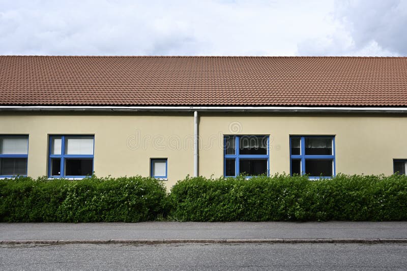 Front View of a Building with a Tiled Roof Stock Photo - Image of ...