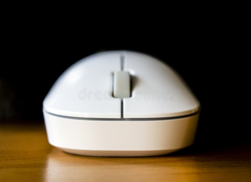 Front View Close Up of an Aerodynamic Shaped White Computer Mouse or ...