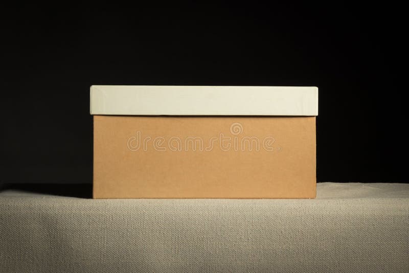 Front View on Closed Brown Cardboard Box on Black Background, Copy ...