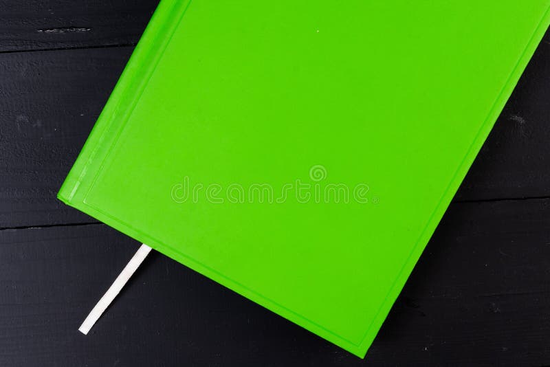 Front View Closed Colored Notebook Bookmark Inside. Abstract Background ...