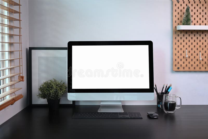 Front View Computer with Empty Display, Picture Frame, Houseplant and ...