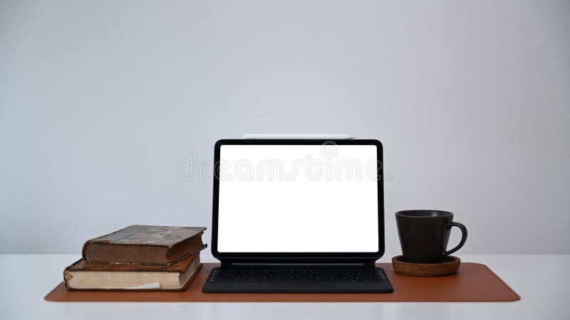 Computer Tablet, Books and Coffee Cup on White Office Desk. Stock Image ...