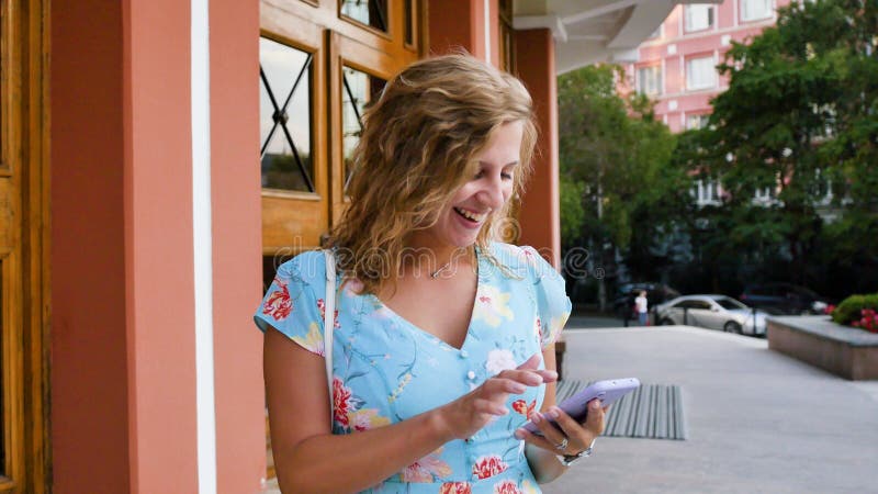 Front View of Confused Woman Walking and Checking the Contents of the ...