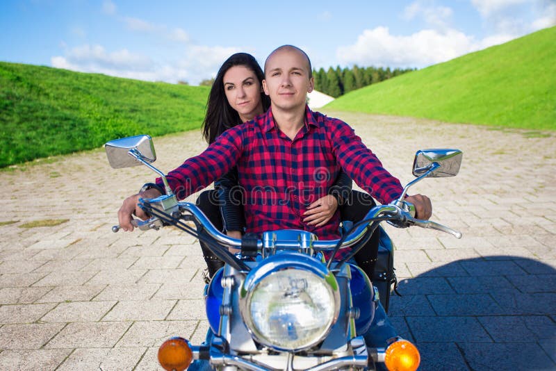Front View of Couple Riding on Vintage Motorcycle Stock Photo - Image ...