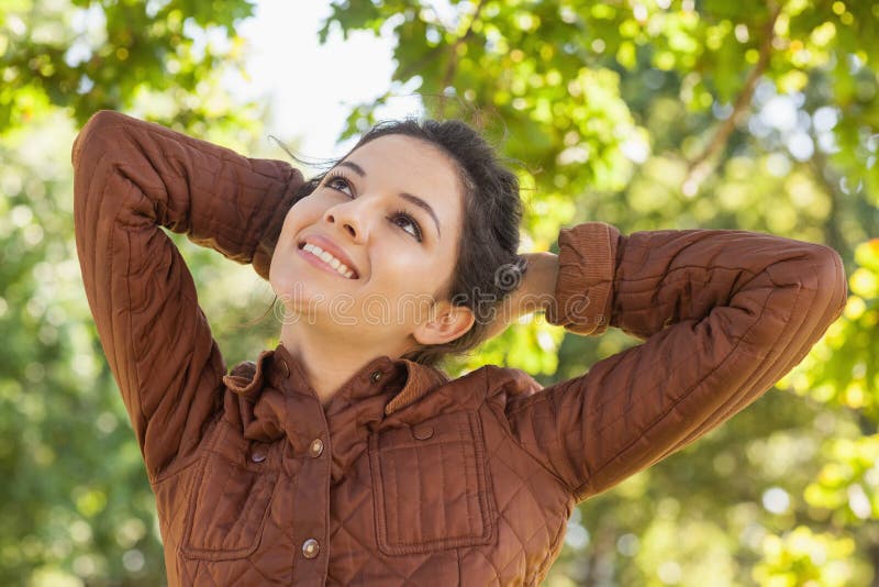 Front View of Cute Woman Posing in a Park Stock Photo - Image of person ...