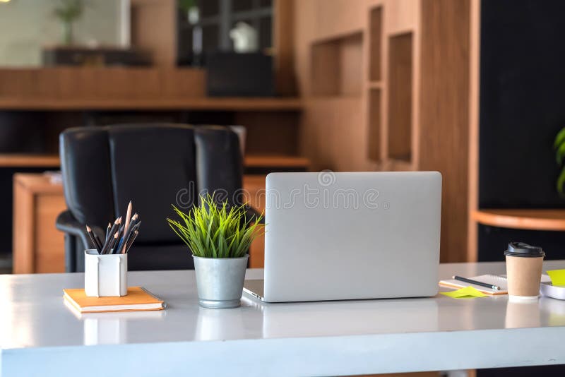 Front View on the Desk in the Office There are Working Equipment Place ...