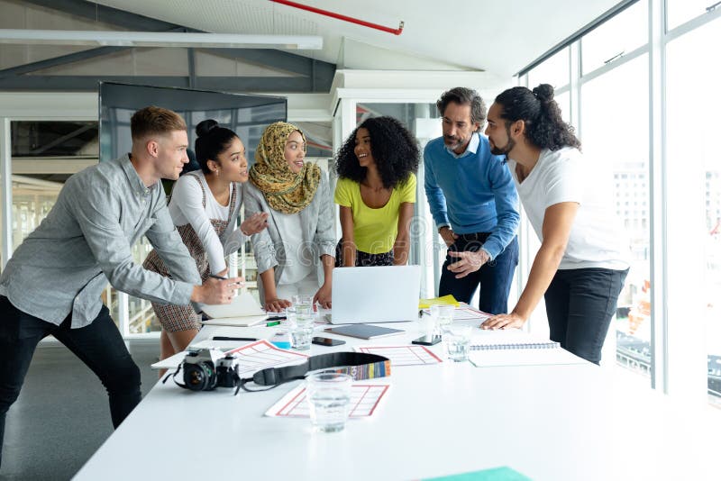 Business People Interacting with Each Other at Conference Room in a ...