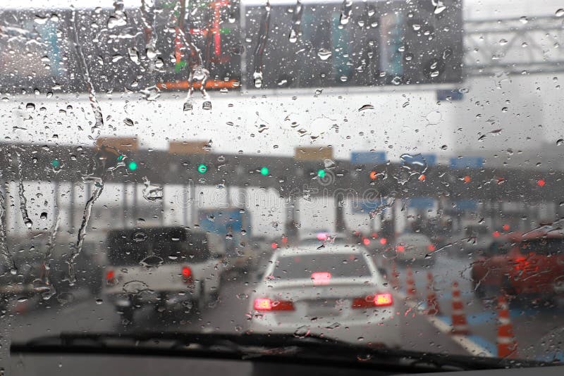 Front View of Driving with Car Windshield Wipers in Raining Day on the ...