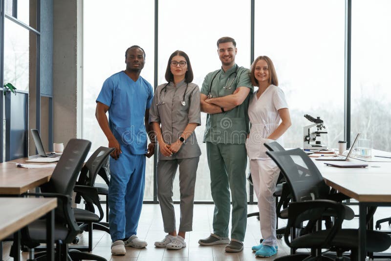 Front View. Group of Doctors are Together Indoors Stock Photo - Image ...