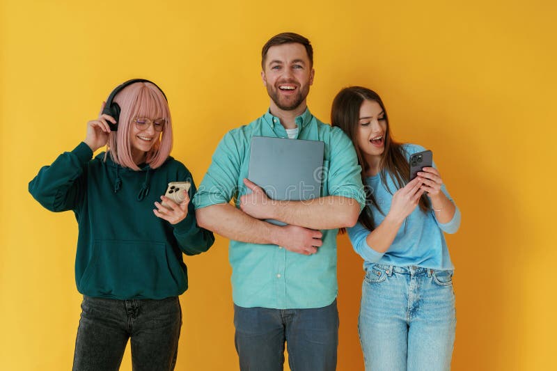 Front View. Group of Friends are in the Studio Against Background Stock ...