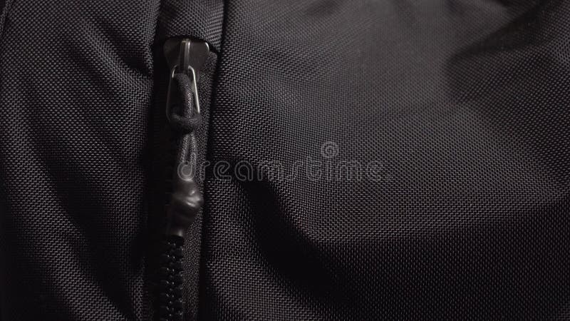 Front View of a Hand Opening Zipper of a Sports Backpack. Stock Photo ...