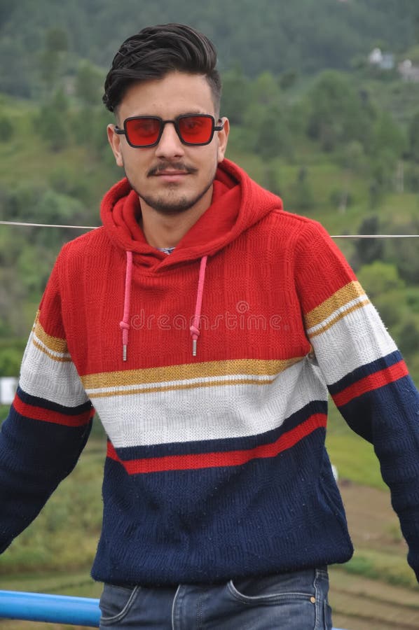 Front View of a Handsome Indian Young Guy Wearing Sunglasses, Standing ...
