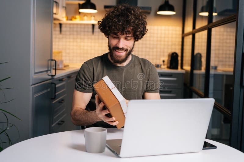 Front View of Happy Smiling Young Man Opening Gift Box with Present ...