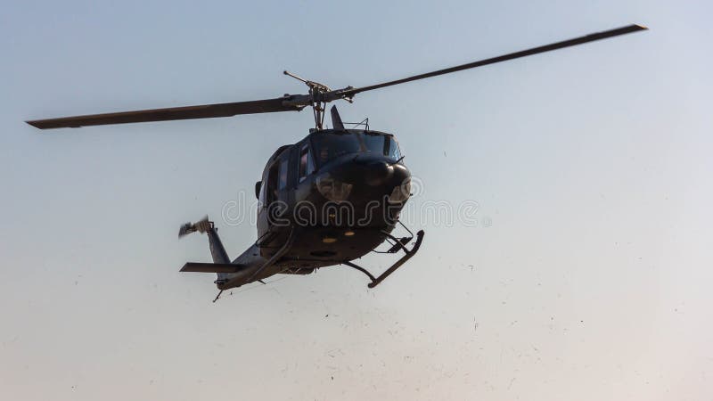 Front View of Helicopter in Flight. Fly on Blue Sky Editorial ...