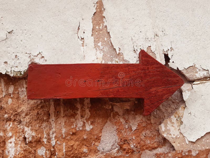 Front View of Indicator Arrow on Uncorked Cement Wall. Signage and ...